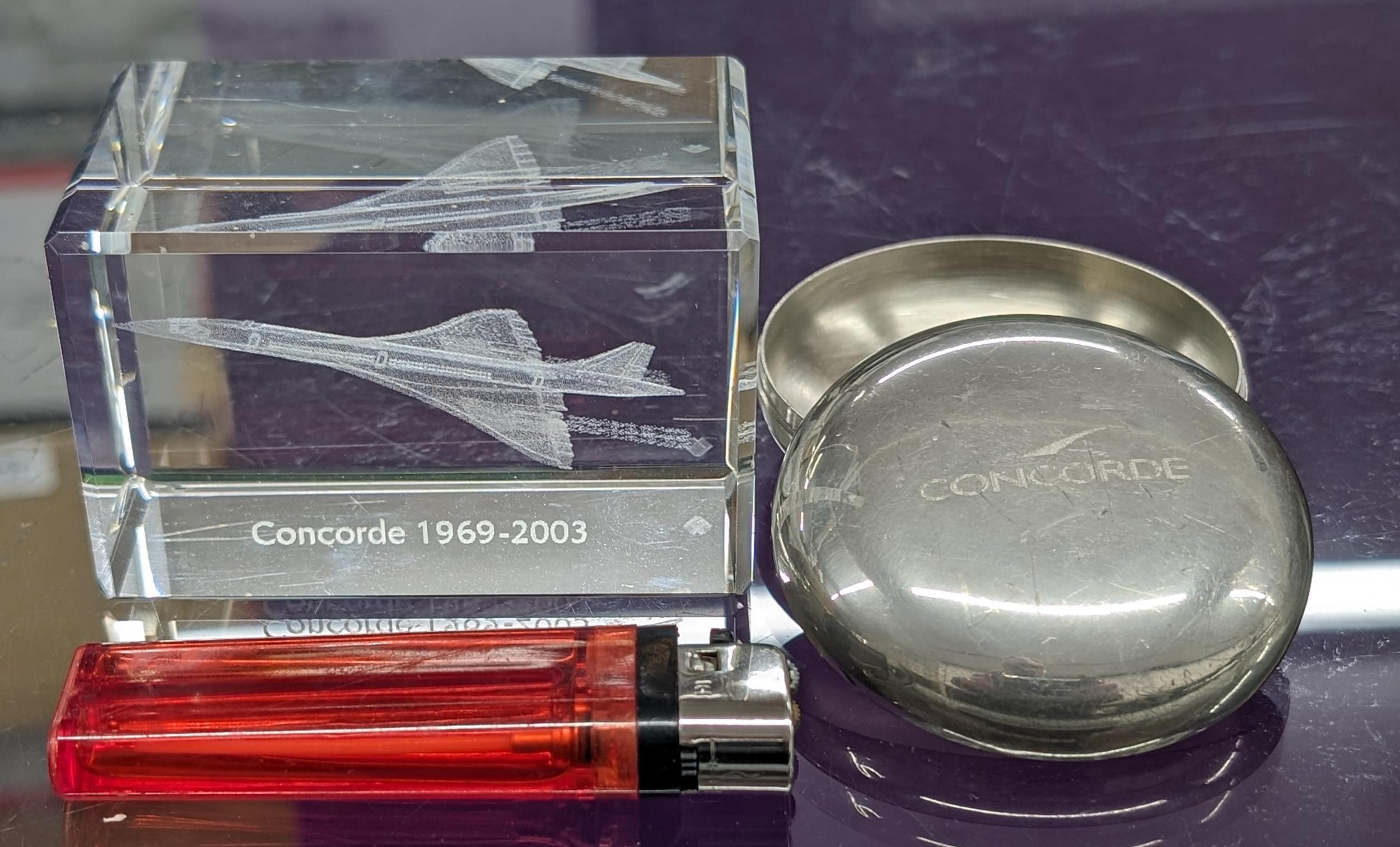 Concorde memorabilia being paperweight and small silver plate pot