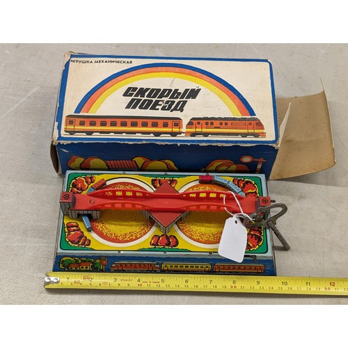 Boxed vintage foreign tin plate wind up train toy with key in working order