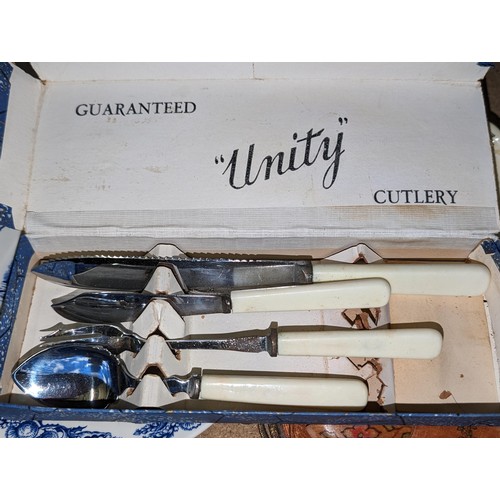 Boxed vintage Unity 4-piece cutlery set