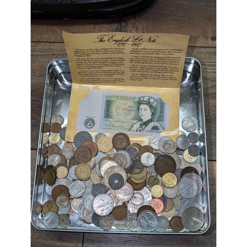 Tin of mixed silver and copper coins & Clover complimentary crisp UK £1 ...