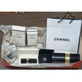 Bundle of assorted size Chanel perfume bottles, boxes and other accessories