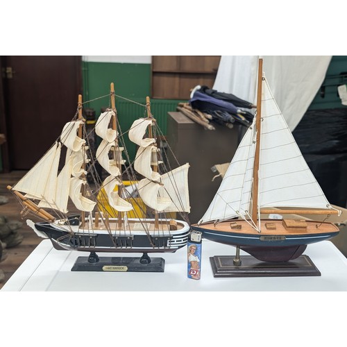 2 x wooden model boats being HMS Warrior and Brixham trawler yacht