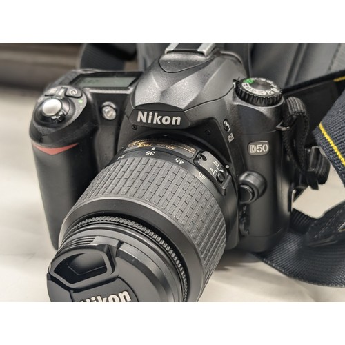 Nikon D50 DSLR Camera with 18-55mm Lens and Town & Country Bag