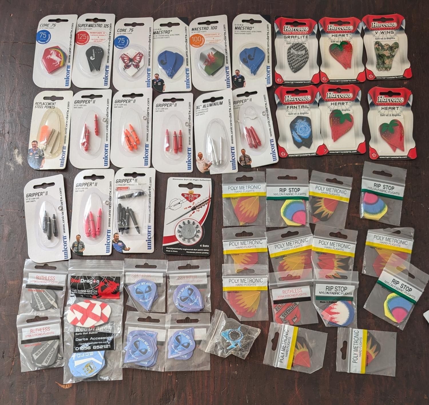 A Large Collection of New and Unused Modern Dart Accessories, including ...