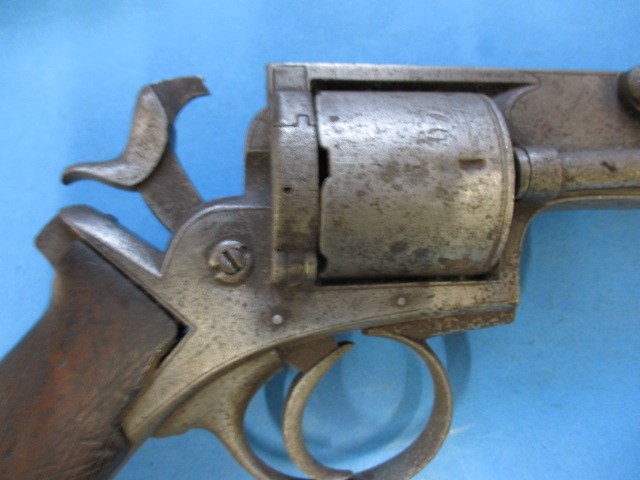 An antique 6 shot pin-fire revolver with original leather holster ...