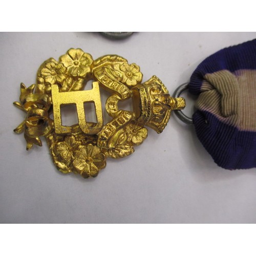 A parcel of 19th century Primrose League badges and medals. The ...