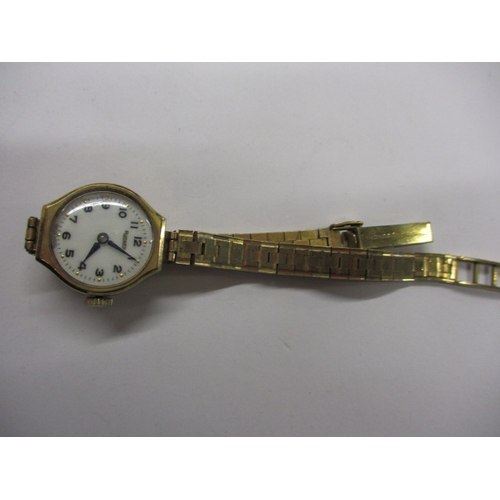 A vintage Rotary 9ct gold watch with integral gold strap, and another ...