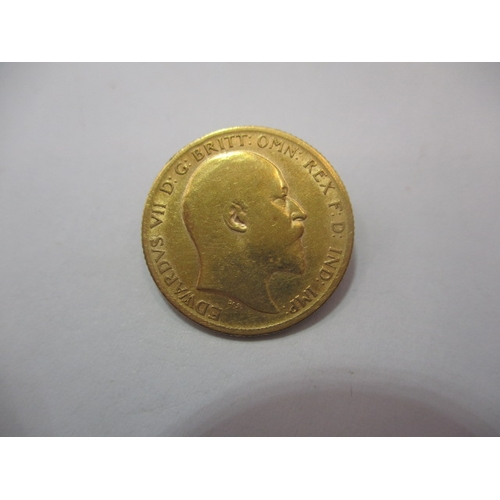 A Edward VII gold half sovereign dated 1905, a circulated coin with ...