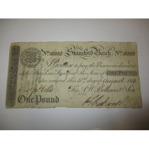 A Regency one pound note, issued by the Stamford Bank 1813, No.16222. A ...