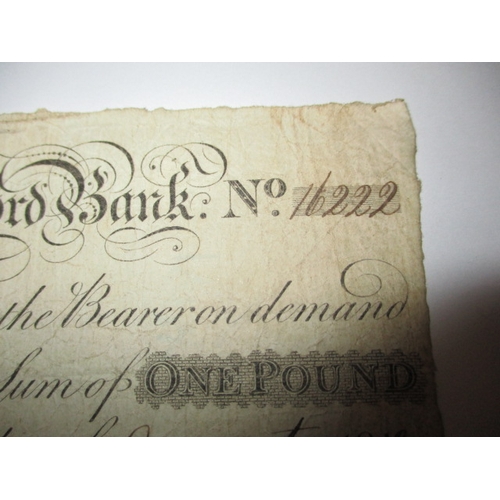 A Regency one pound note, issued by the Stamford Bank 1813, No.16222. A ...