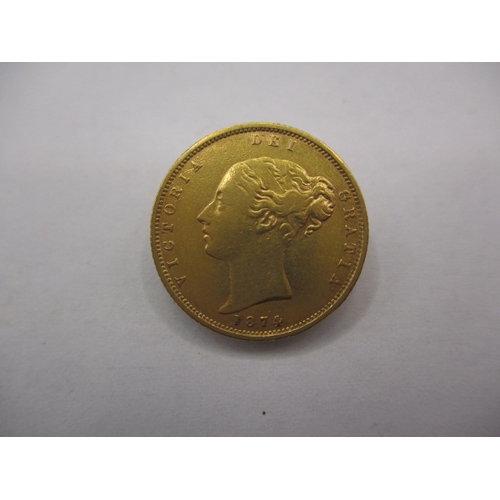 A Victorian gold half sovereign dated 1874, a circulated coin with fine ...