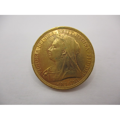 A Victorian gold sovereign dated 1894, a circulated coin with fine ...