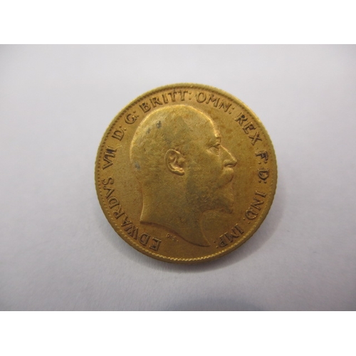 An Edward VII gold half sovereign dated 1904, a circulated coin with ...