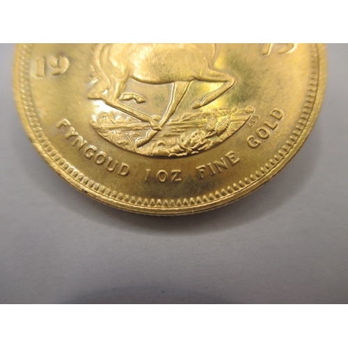 A 1975 Gold Krugerrand coin, a near uncirculated coin