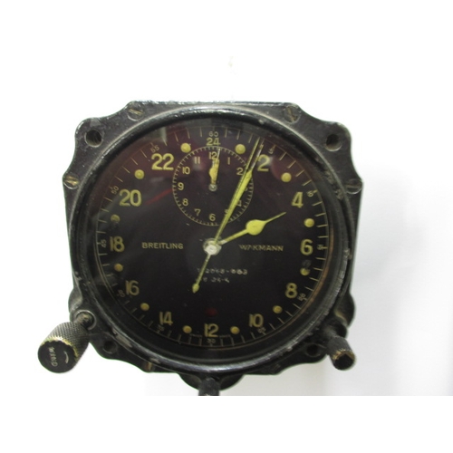 A cold war period Breitling Wakmann aircraft clock with red/white dule ...