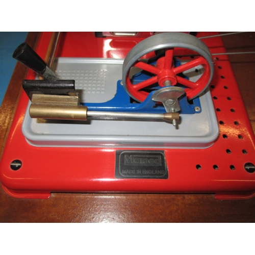 A vintage Mamod SE2A live steam model boiler and engine with an array ...