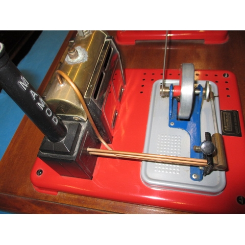 A vintage Mamod SE2A live steam model boiler and engine with an array ...