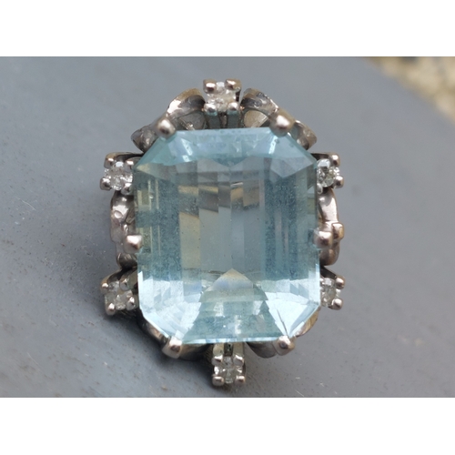 A large rectangular aquamarine & diamond ring in white metal. Finger ...