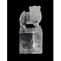 A CHINESE UNCARVED ROCK CRYSTAL SEAL 19TH CENTURY 10.5cm high, base 3cm ...