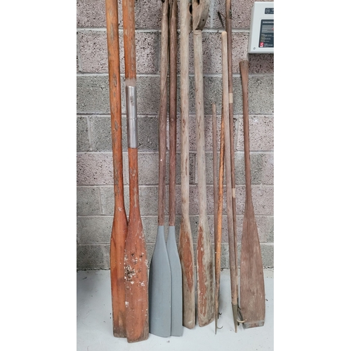 A COLLECTION OF VINTAGE WOODEN BOAT OARS & HOOOKS, 7 oars; one is a ...