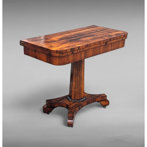 AN EXCELLENT REGENCY ROSEWOOD CARD TABLE, with canted corners, opening ...