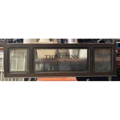 A LARGE HEAVY HARDWOOD FRAMED BAR SIGN, with three panels of double ...