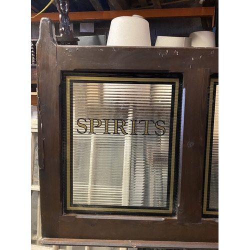 A LARGE HEAVY HARDWOOD FRAMED BAR SIGN, with three panels of double ...