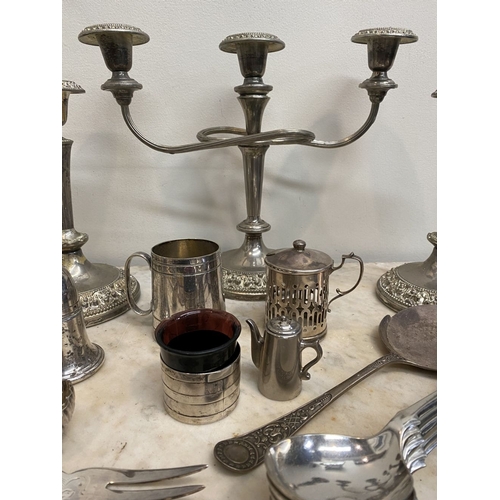 A LARGE COLLECTION OF SILVER PLATED WARE, to include candlesticks ...