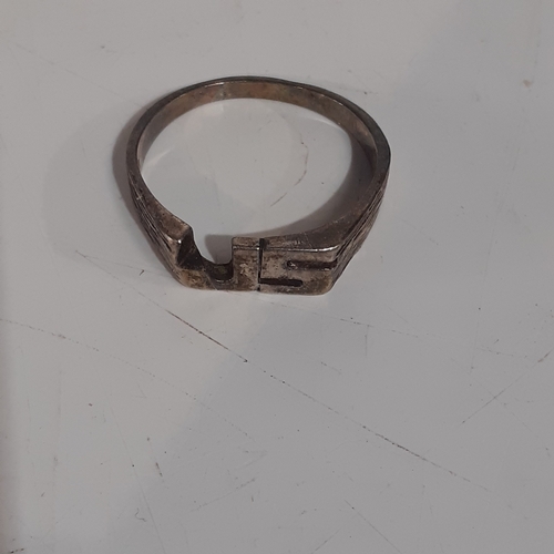 Sterling silver ring with initials JS.