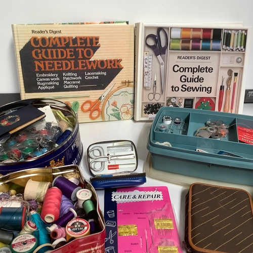 Selection of sewing bits in tins plus two books