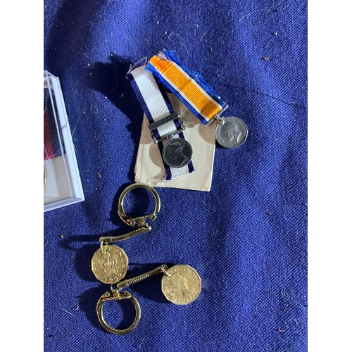 Cased wellington Waterloo medal and 2x miniature defence medals