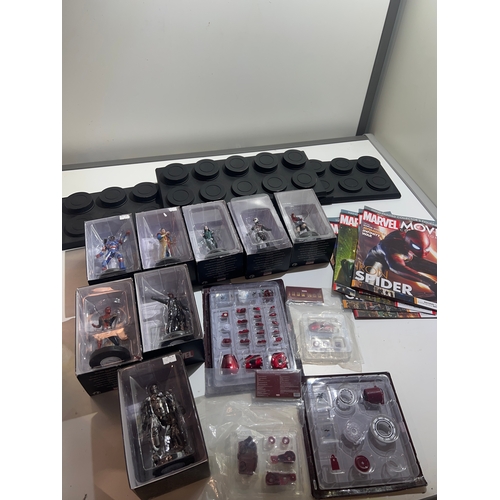 Quantity of hand painted marvel figures - with magazines and stands ...