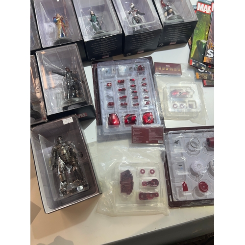 Quantity of hand painted marvel figures - with magazines and stands ...