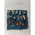 Set of golly pin badges inc basketball player, swimmer and cheerleader