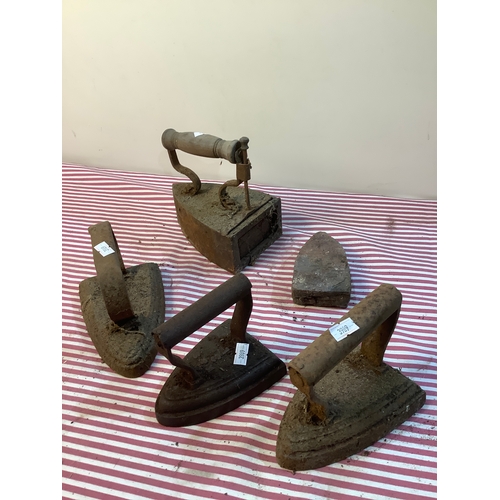 Collection of cast iron flat irons plus Victorian slug iron