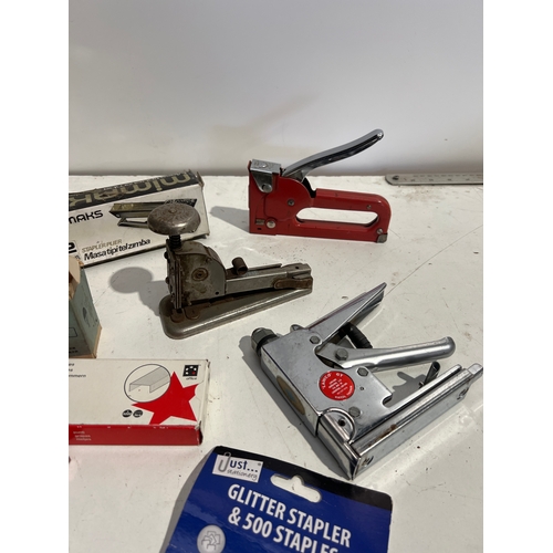 Quantity of hand staplers with various staples