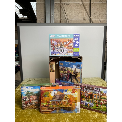 Collection of 8 jigsaw puzzles