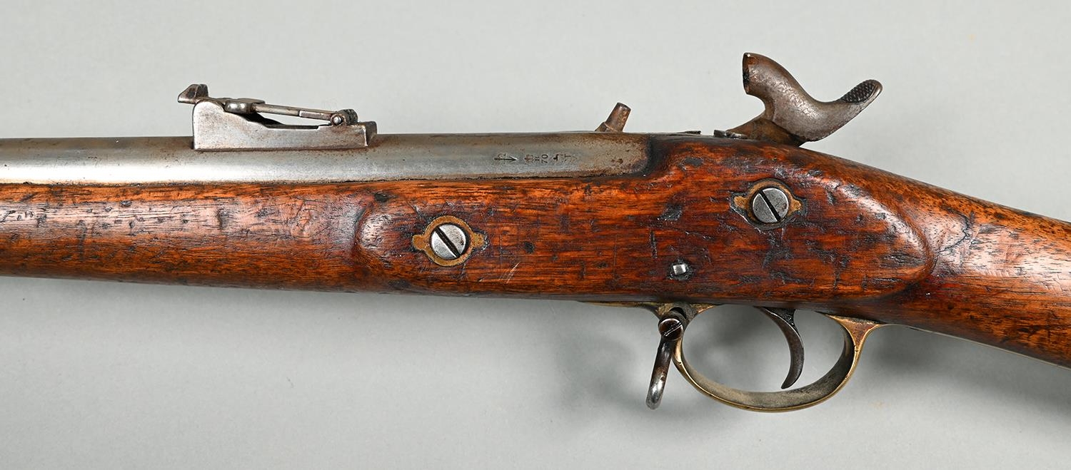 An Enfield three band rifle, dated 1857, the percussion lock stamped ...