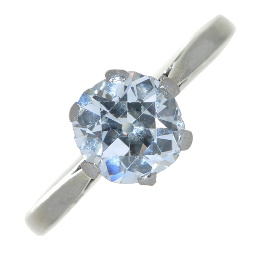 A diamond solitaire ring, with irregular old cut diamond, in platinum ...