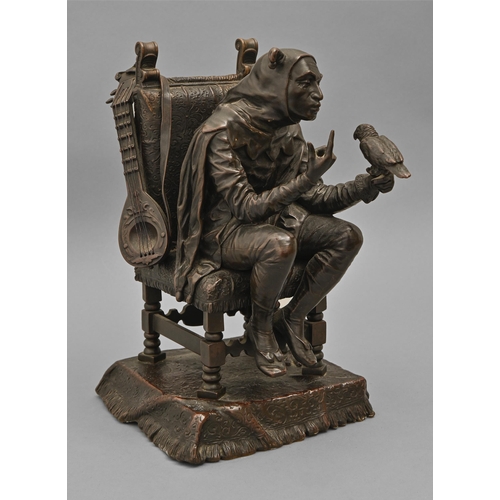 A bronze sculpture of a jester training a bird, cast from a model by F ...