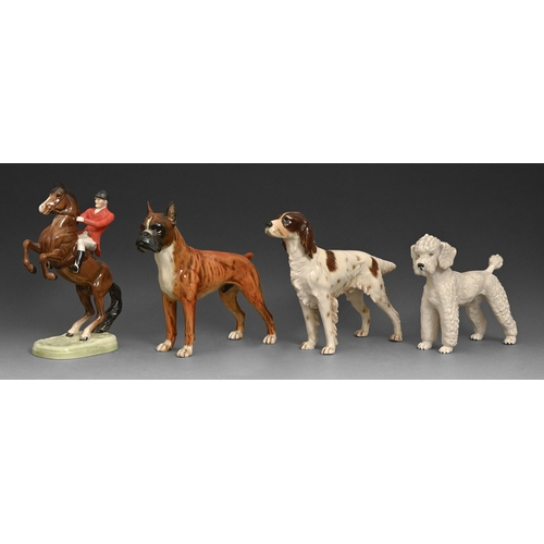 A Beswick equestrian figure of a huntsman on a rearing horse, 24.5cm h ...
