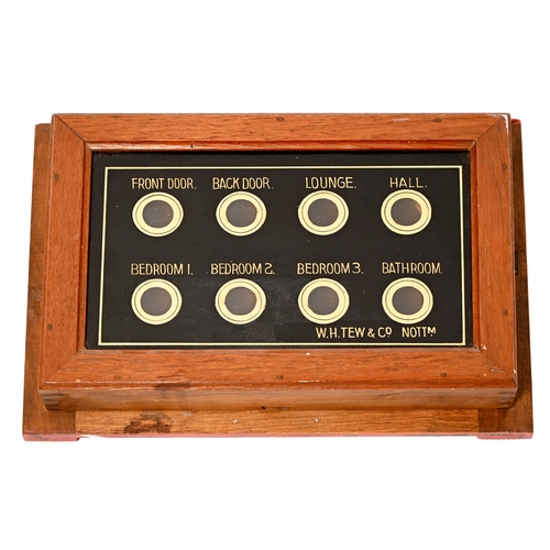An Edwardian electrical walnut servant's bell board, W H Tew & Co ...