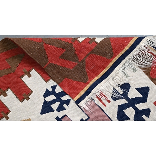 A Middle Eastern rug, mid 20th c, 214 x 132cm, another contemporary ...