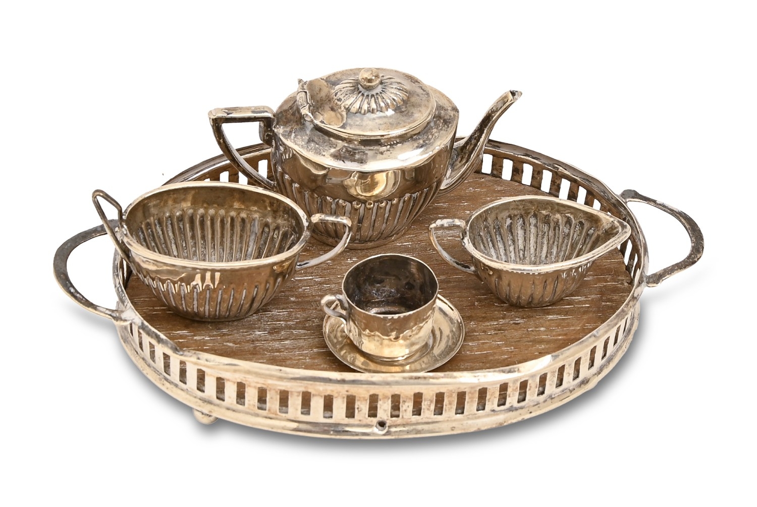 A George V miniature or toy silver tea service, tray 10.5cm over ...