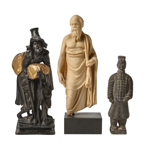 A Northern European stained wood figure of a pedlar, 19th c, 29cm h, a ...
