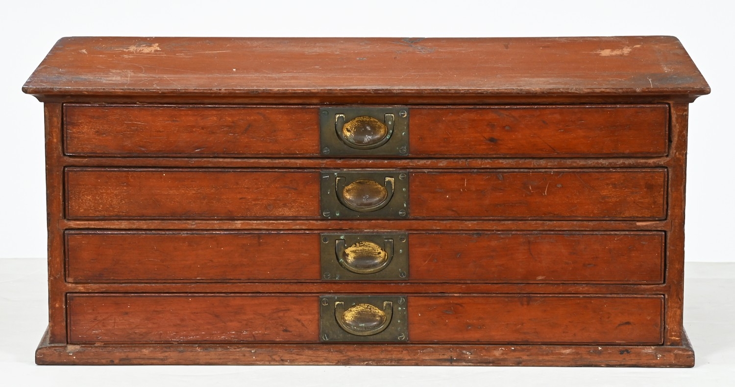 A mahogany counter top chest, c1930, of four drawers, with brass ...