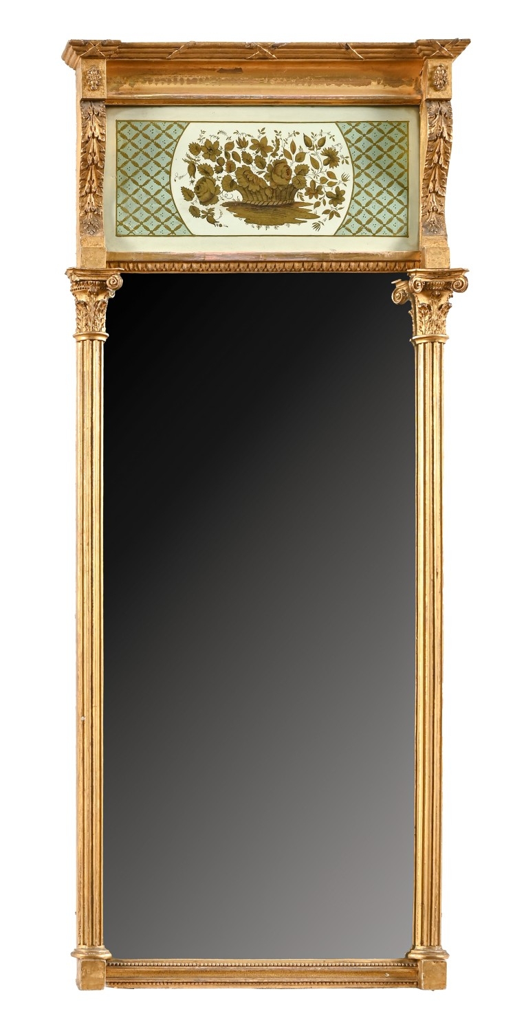 A Regency giltwood and composition mirror, with ribbon-and-reed cavetto ...