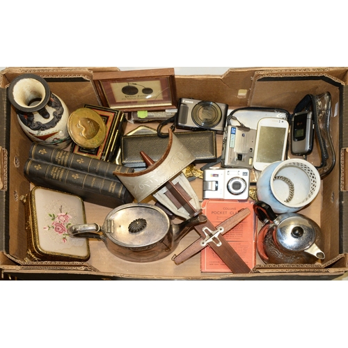 A Victorian handheld stereoscope and a set of photographic stereograms ...