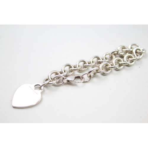 A silver bracelet by Tiffany and Co