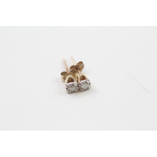 2x 9ct gold diamond stud earrings with scroll backs (1.4g)